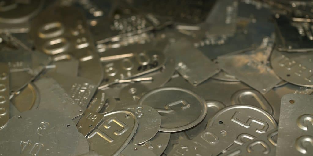 Embossing vs Debossing Difference | Metal Marker Mfg